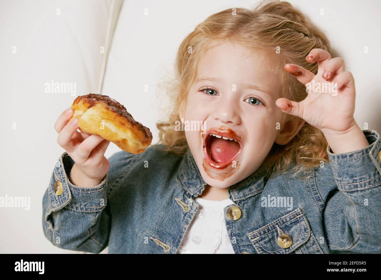 Close up of a girl making a face Stock Photo - Alamy
