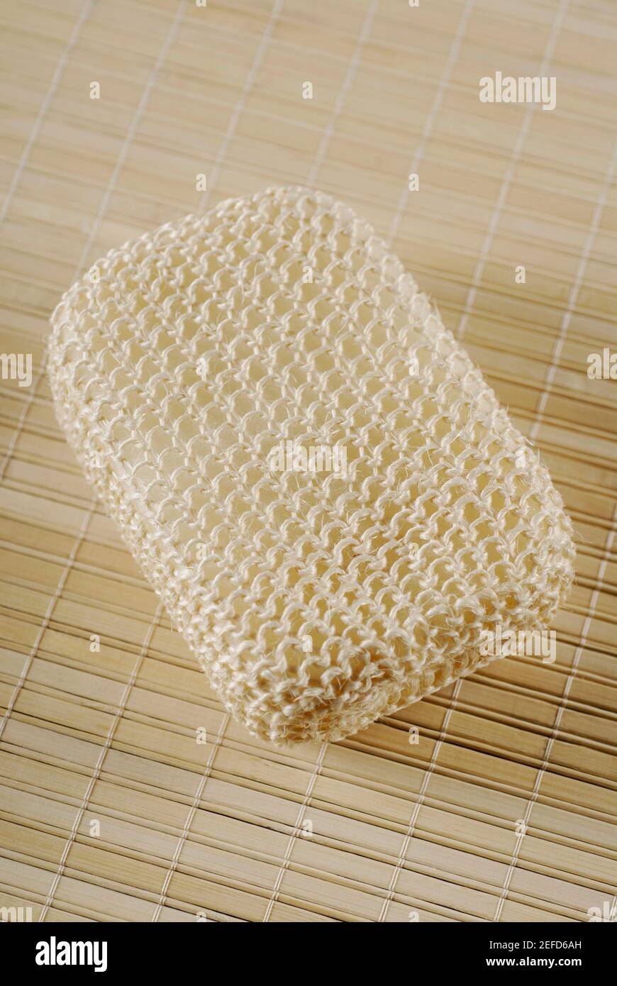 Close up of a loofah on a mat Stock Photo - Alamy