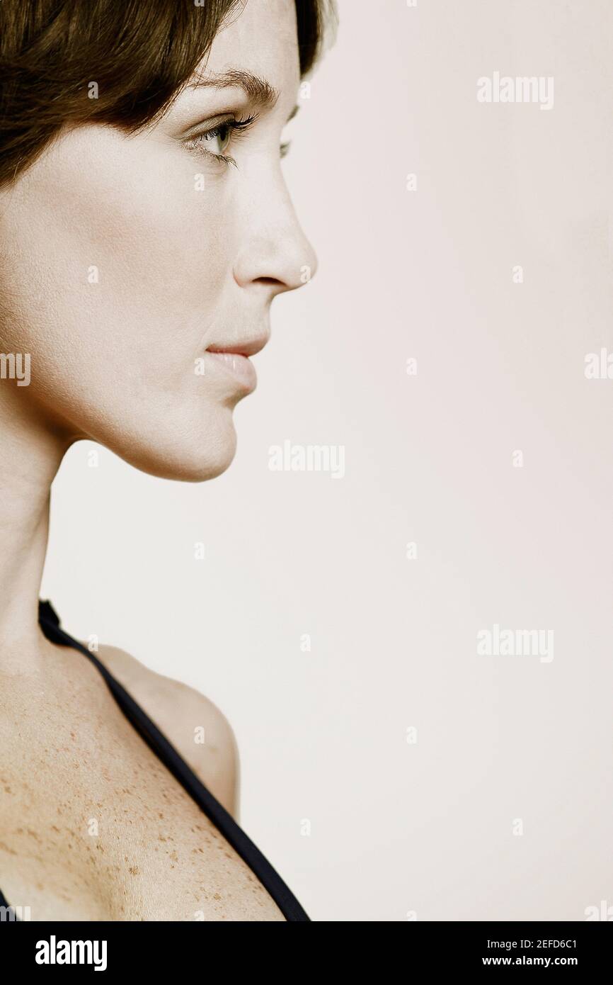 Side profile of a young woman Stock Photo - Alamy