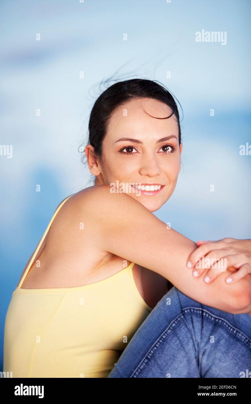 Side profile of a young woman smiling Stock Photo - Alamy