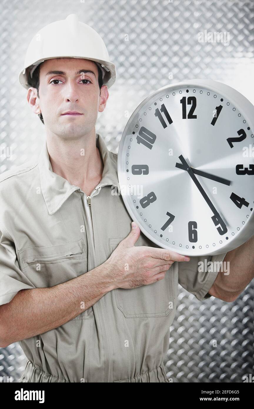 Selective focus man looking clock hi-res stock photography and images ...