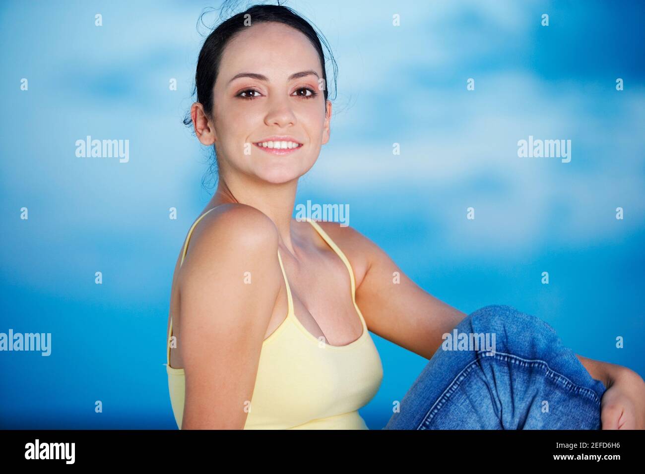 Side profile of a young woman smiling Stock Photo - Alamy