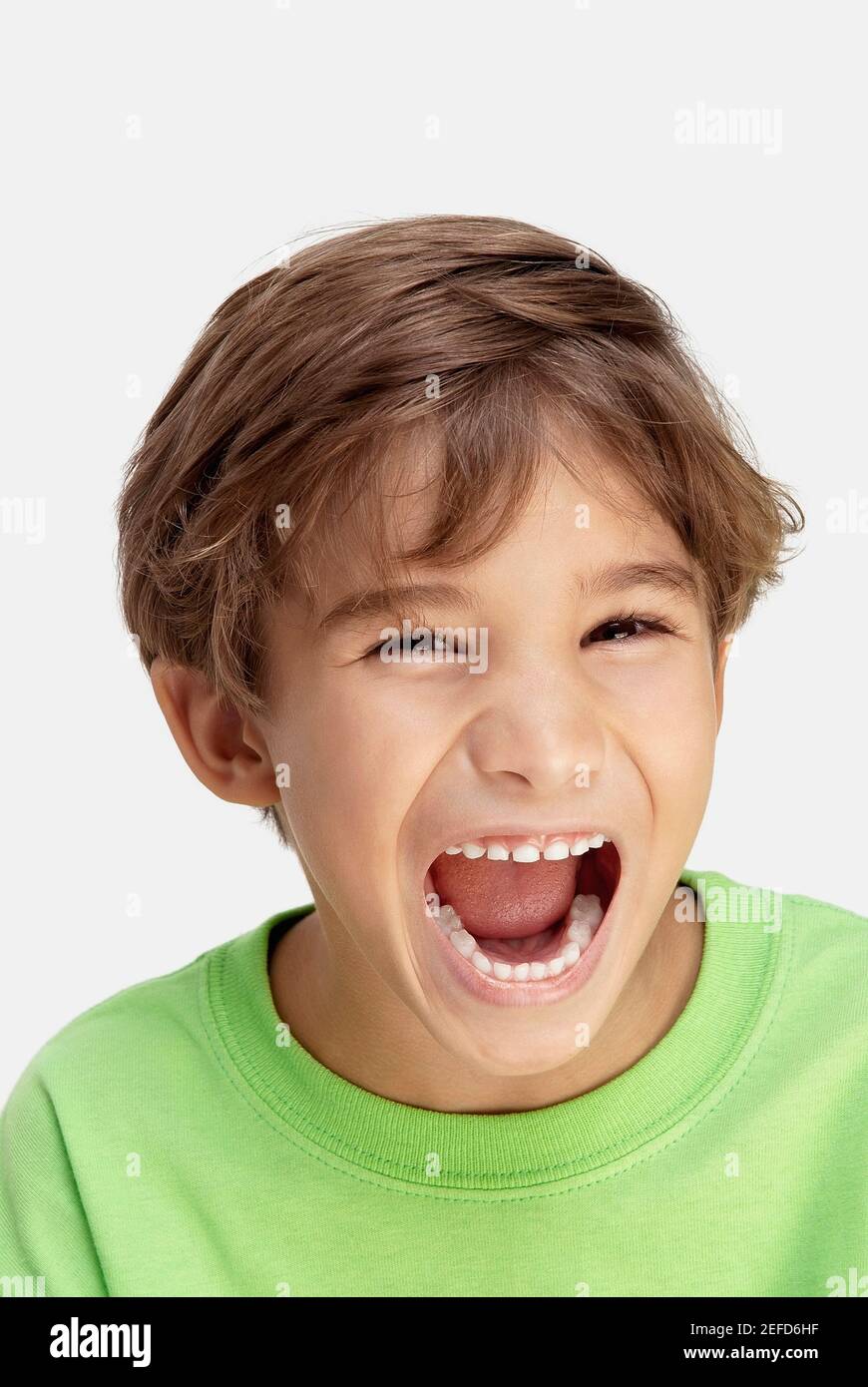 Portrait of a boy laughing Stock Photo - Alamy