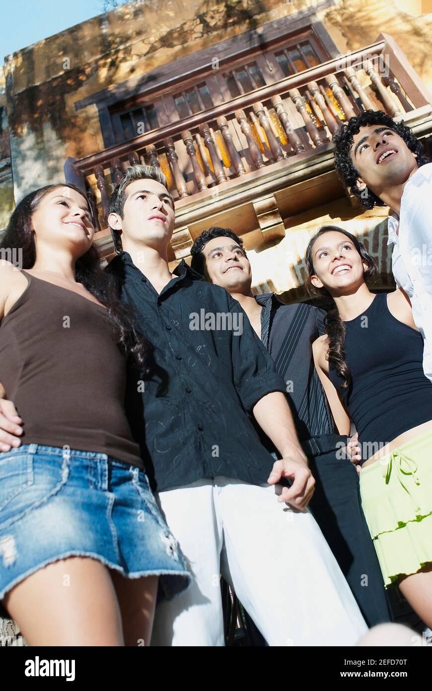 Toothy smile standing open arm hi-res stock photography and images - Alamy