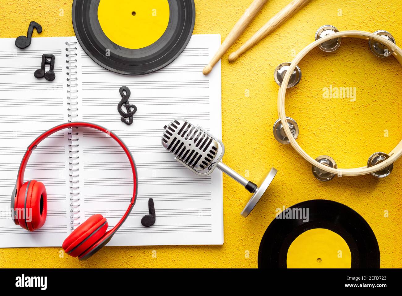 Music flat lay - instruments with vinyl records, overhead view Stock ...