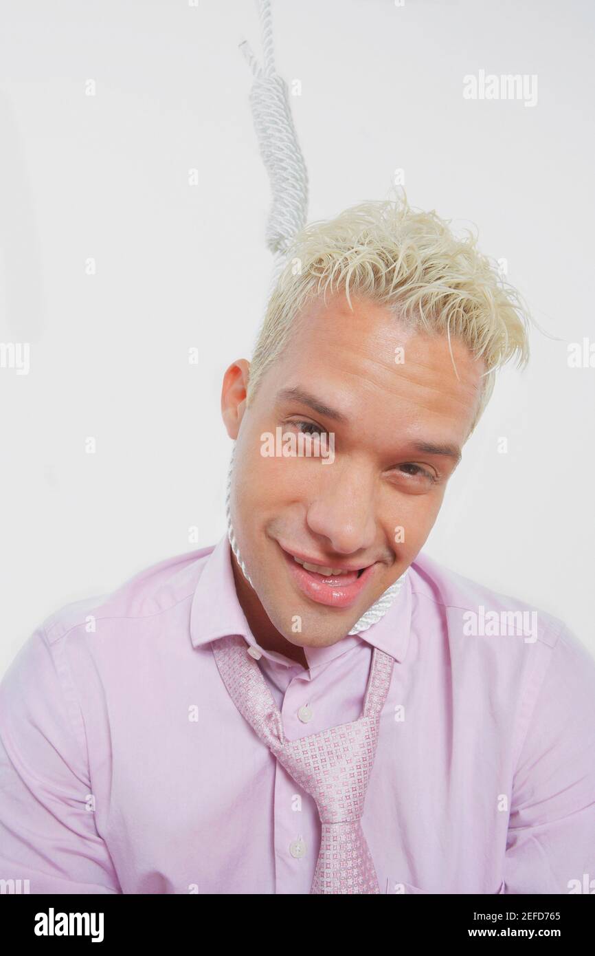 Portrait of a businessman with a noose around his neck Stock Photo - Alamy