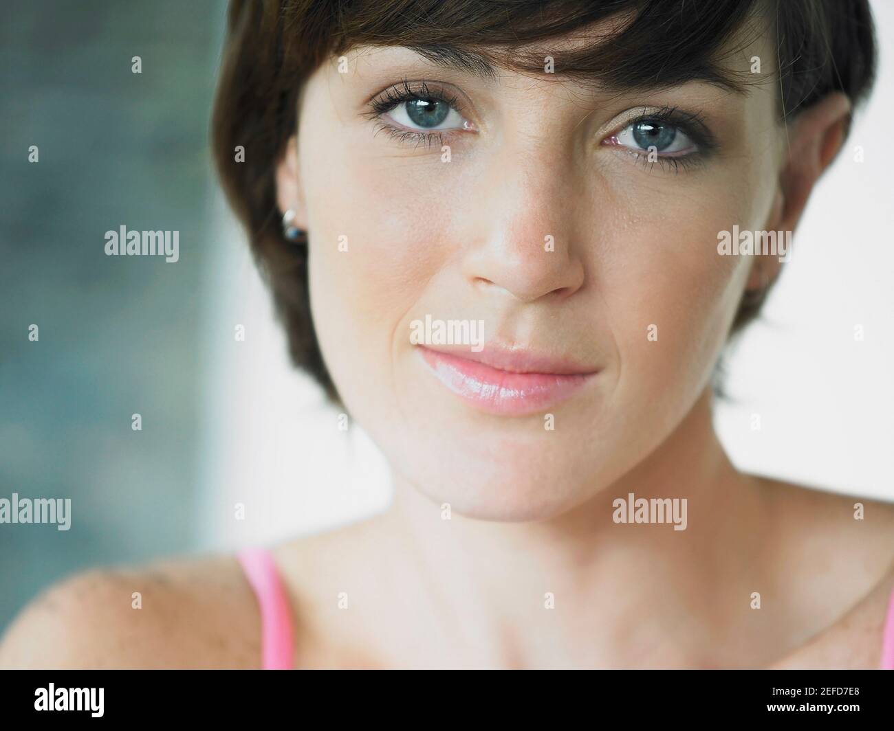 Beautiful woman smirking hi-res stock photography and images - Alamy