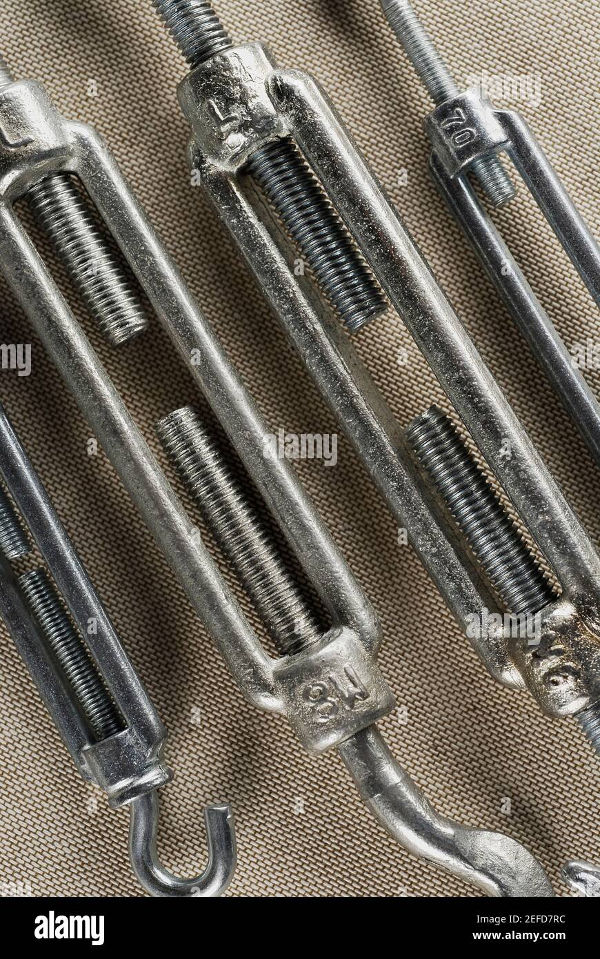 4 hooks hi-res stock photography and images - Alamy