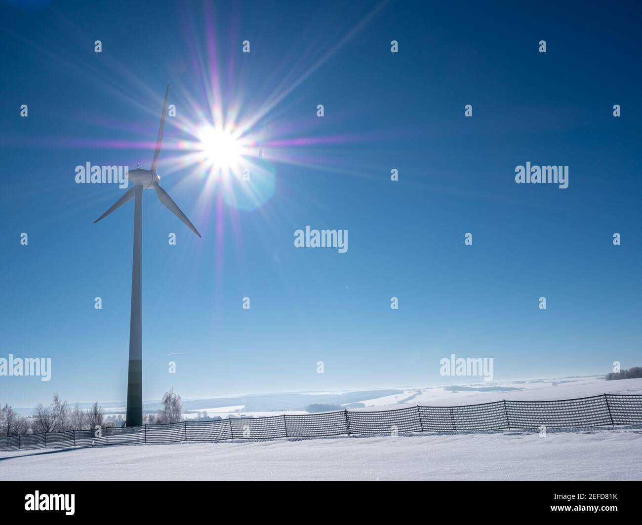 Wind turbine in a winter landscape Stock Photo - Alamy