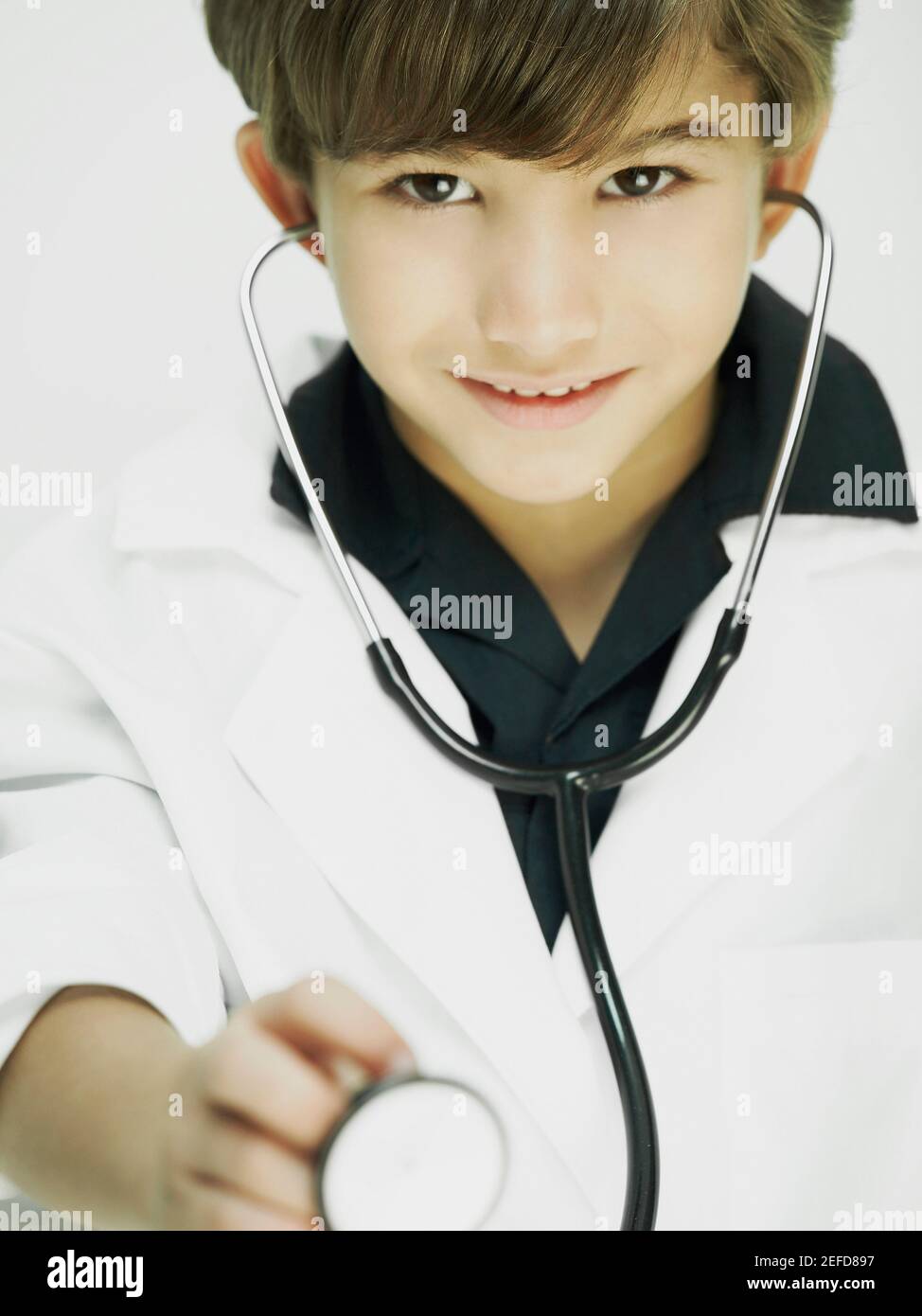 Portrait of a boy dressed as a doctor Stock Photo - Alamy