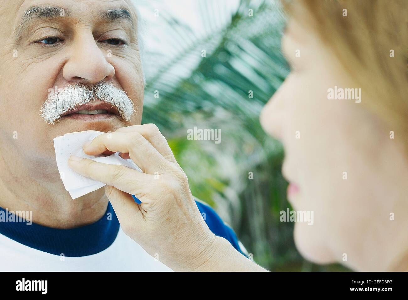 Wiping chin hi-res stock photography and images - Alamy