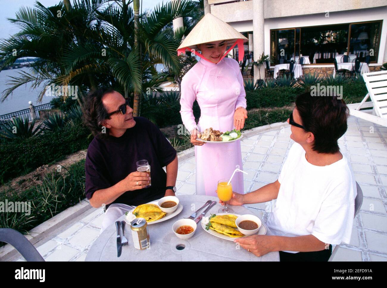Three people dining at Century Riverside Hotel, Hue, Vietnam Stock ...