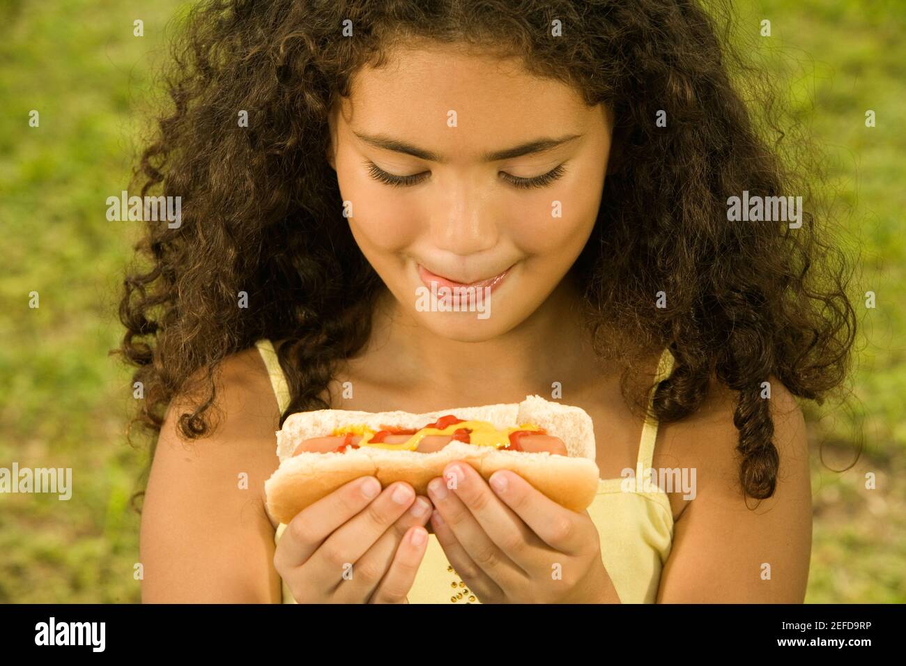 Close-up of a girl holding a sandwich Stock Photo - Alamy