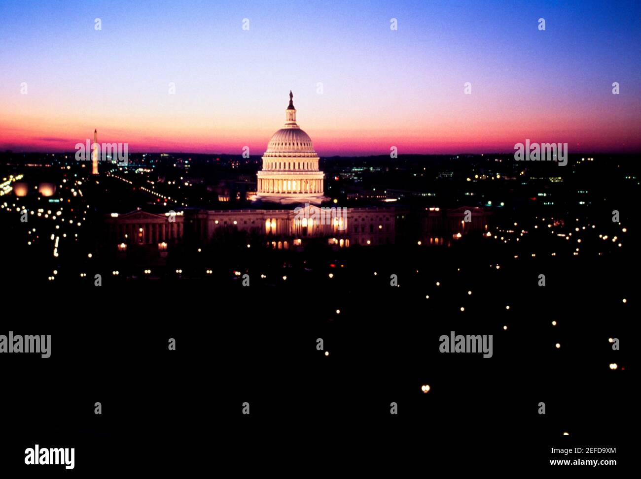 Government building lit up at night, Capitol Building, Washington DC ...