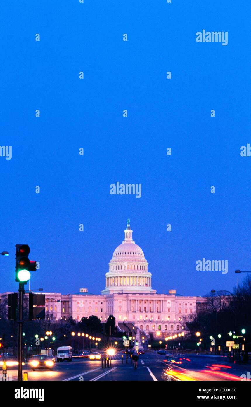 Facade of a government building lit up at night, Capitol Building ...