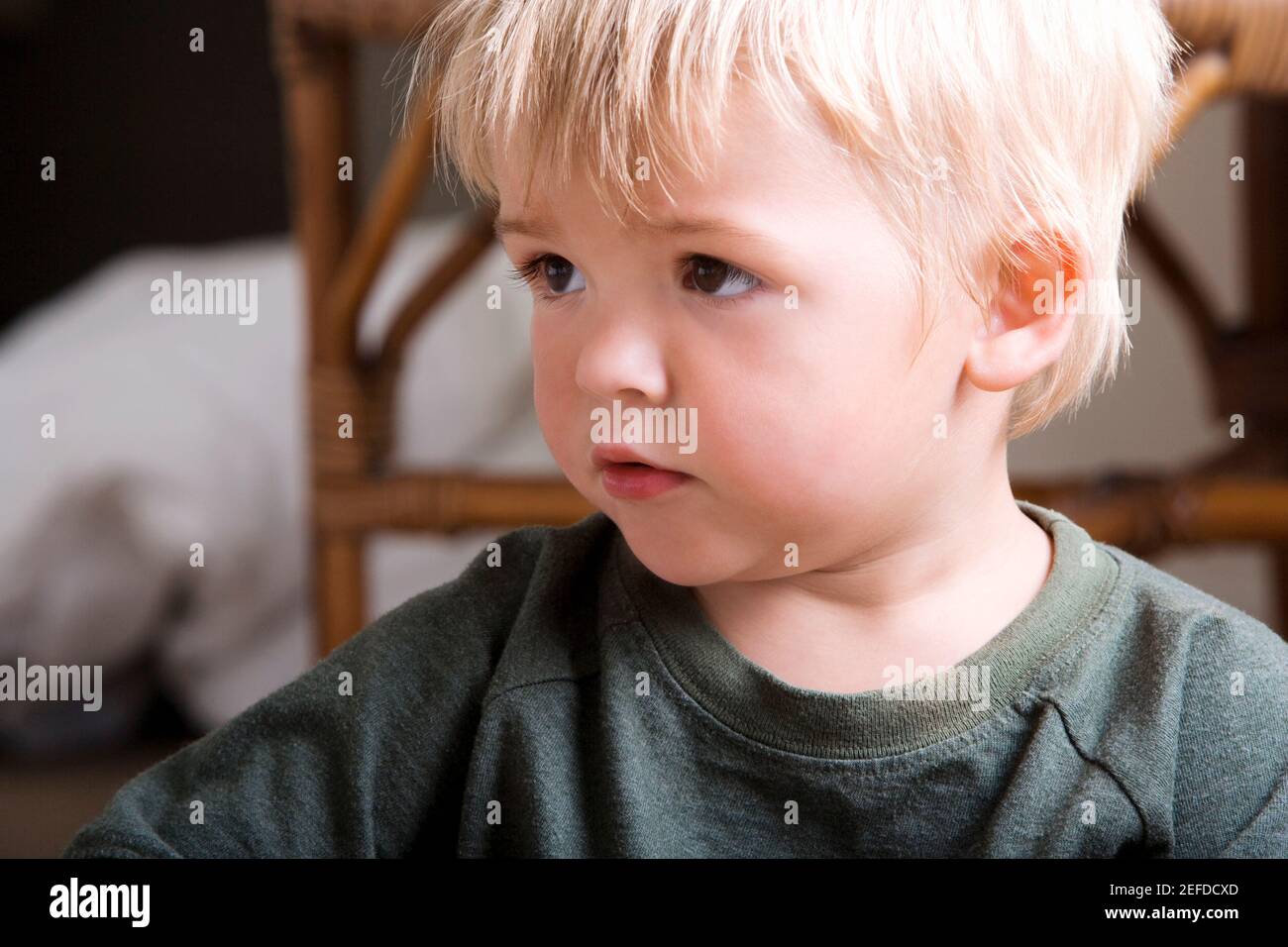 Close-up of a boy looking sideways Stock Photo - Alamy