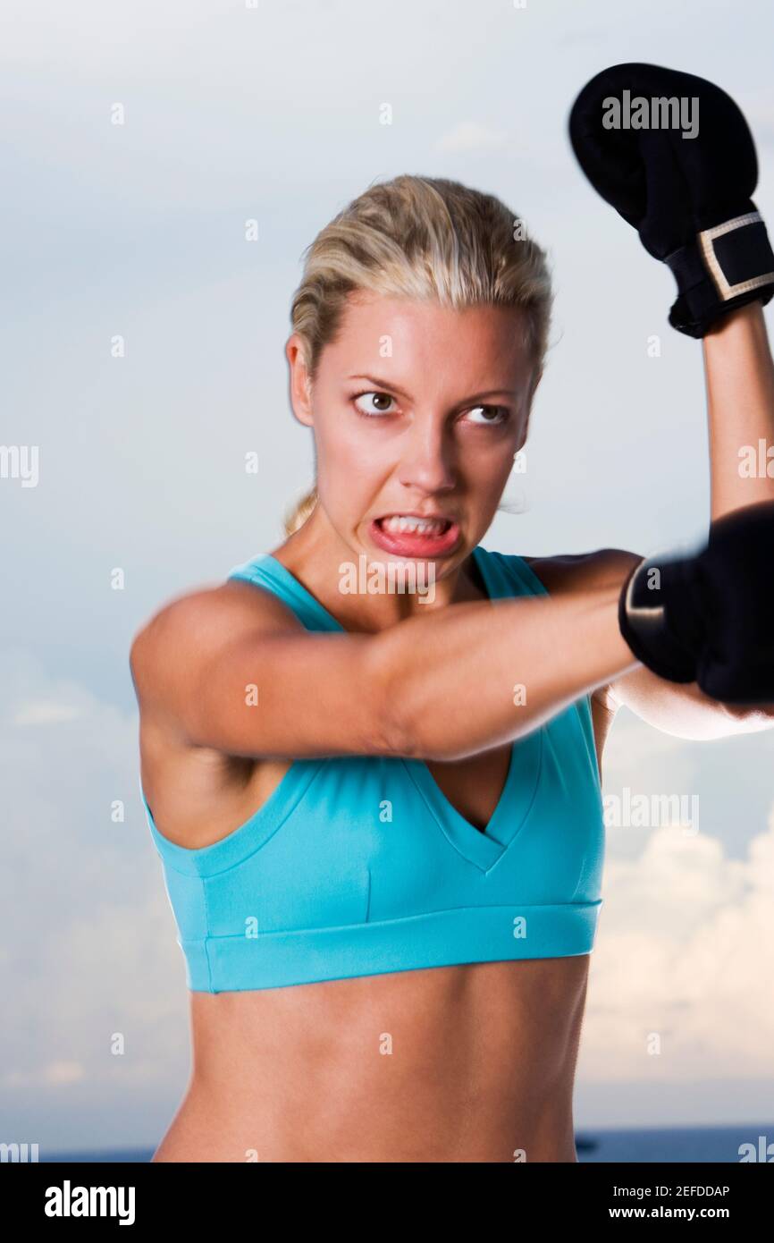 Woman boxing outdoors sky hi-res stock photography and images - Alamy