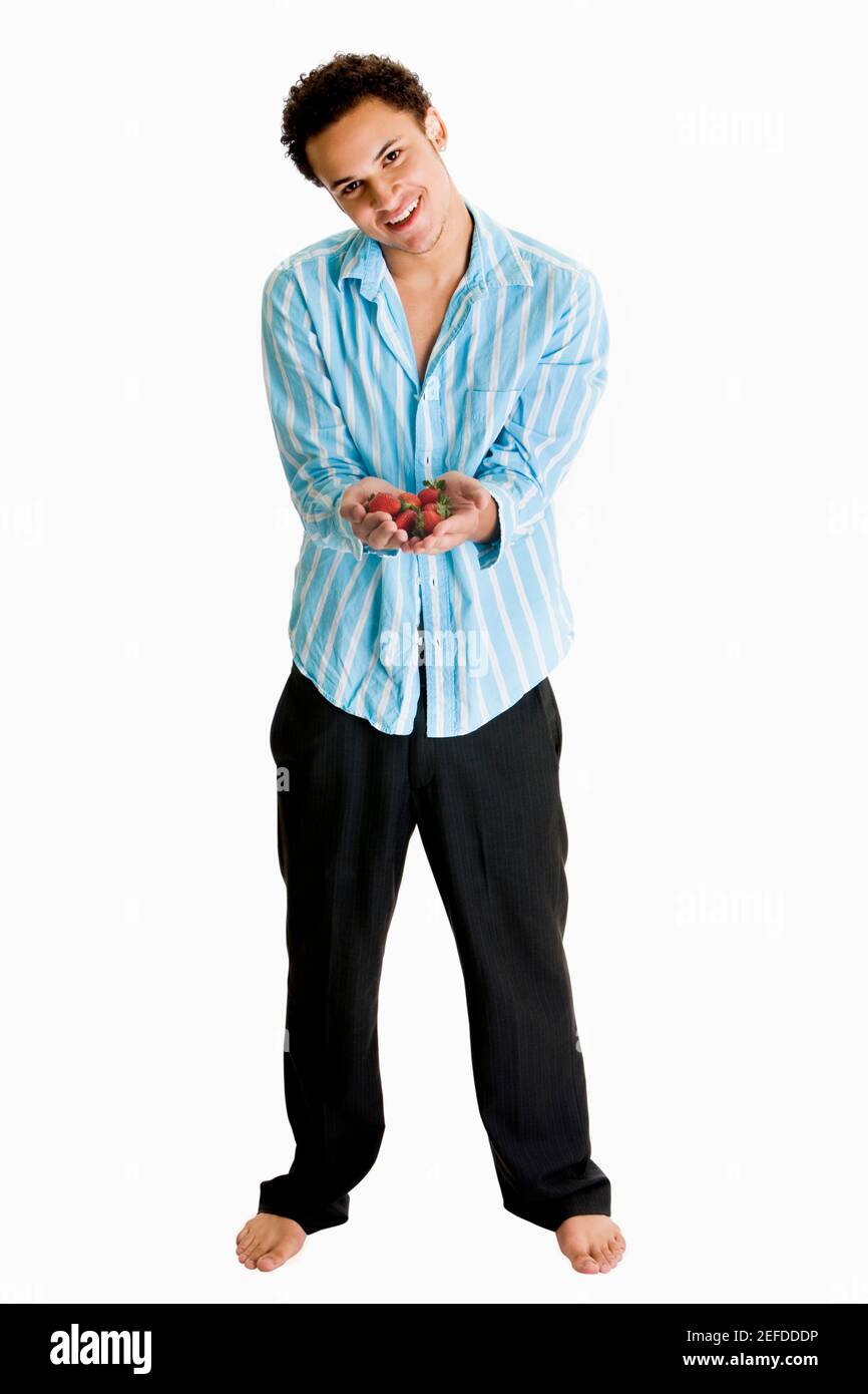 Young hispanic man holding open Cut Out Stock Images & Pictures - Alamy