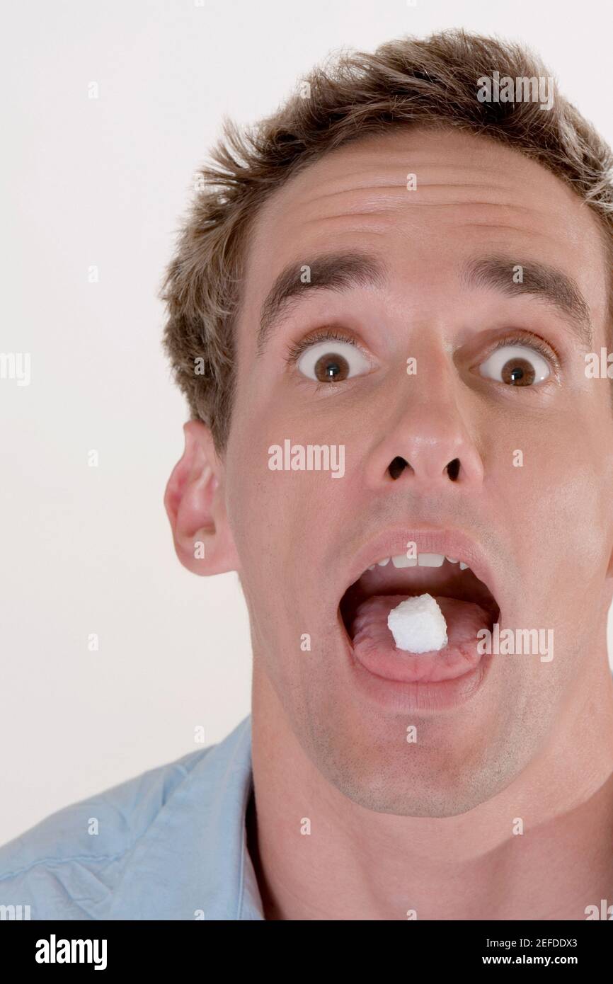 Man mouth open showing tongue hi-res stock photography and images - Alamy