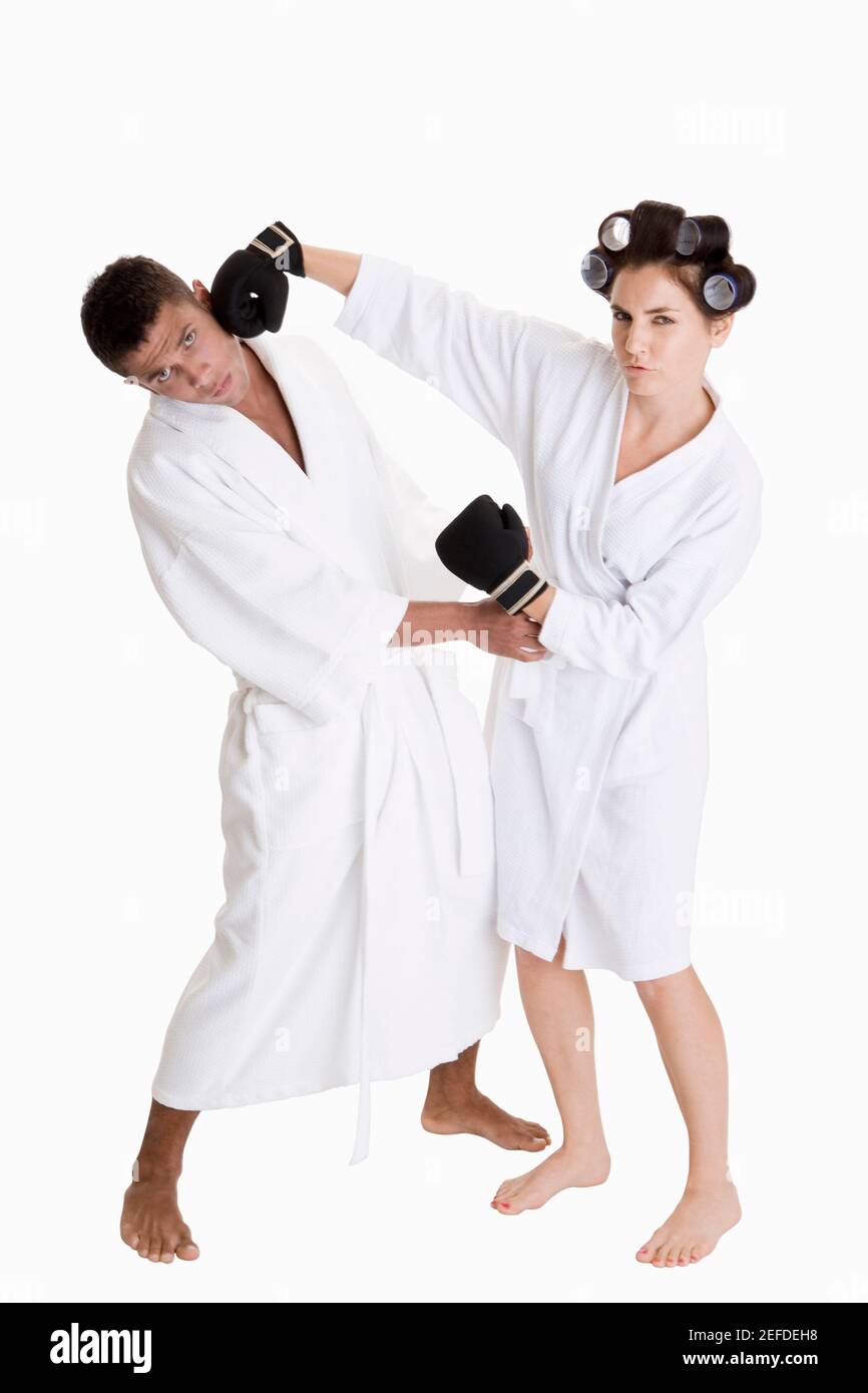 Portrait of a young couple sparring Stock Photo - Alamy