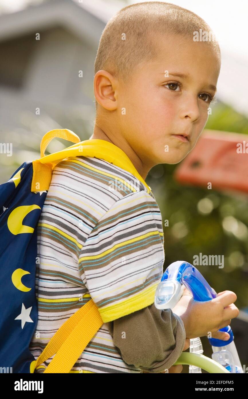 Side profile of a boy looking serious Stock Photo - Alamy