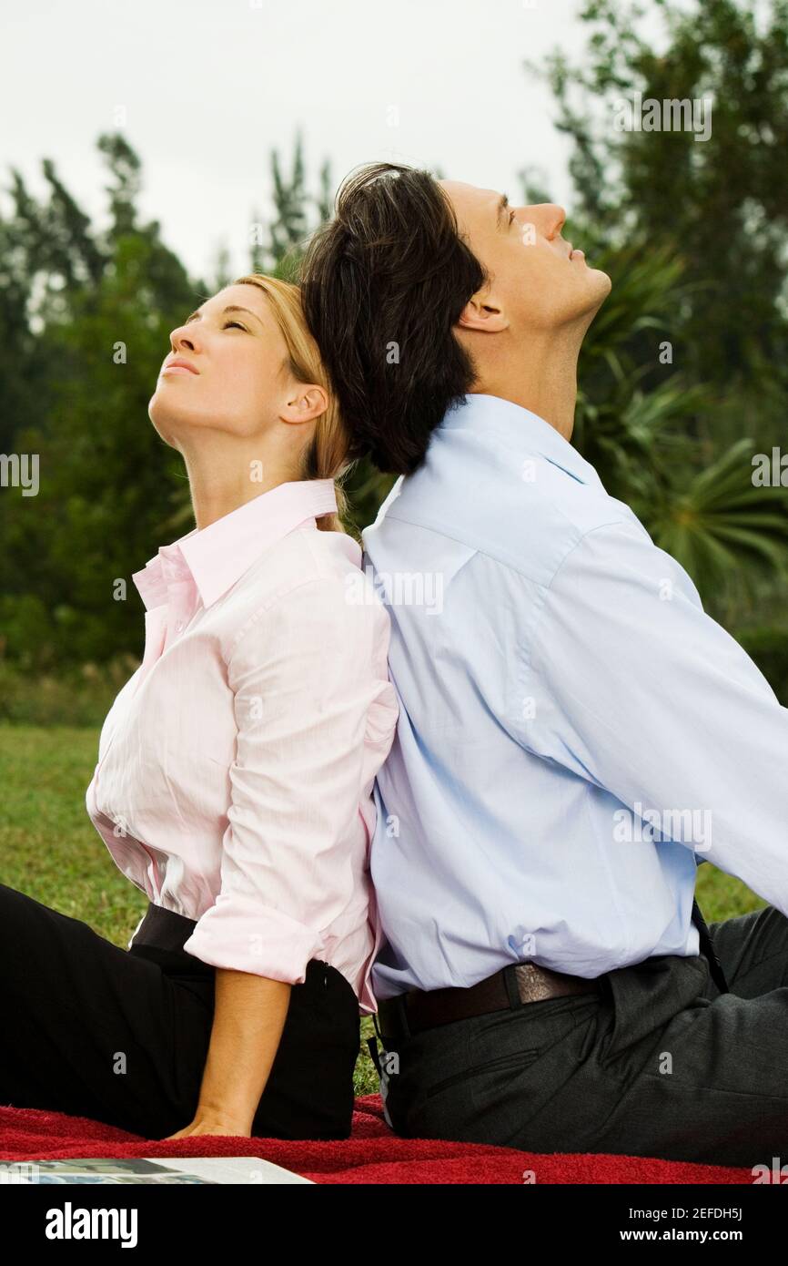 Woman back view profile sitting hi-res stock photography and images - Alamy
