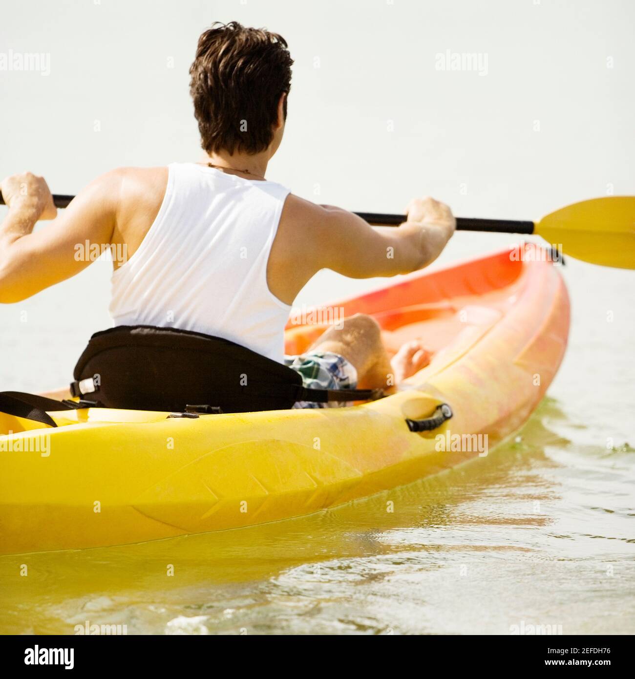 Rear view of a man kayaking hi-res stock photography and images - Alamy