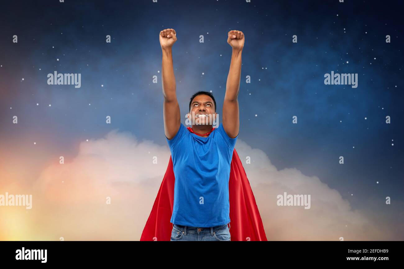 indian man in superhero cape flying in night sky Stock Photo - Alamy