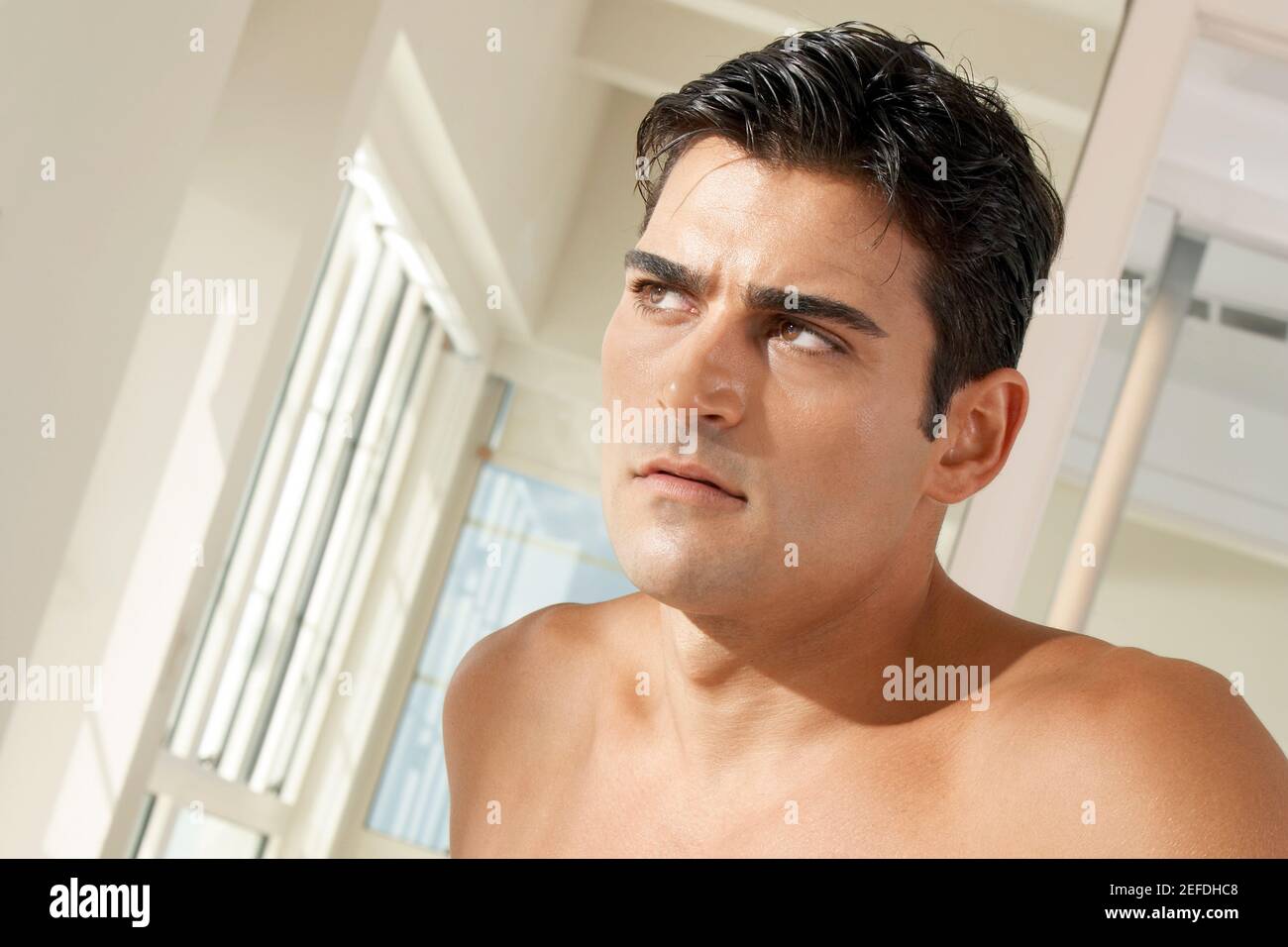 Thoughtful tilt hi-res stock photography and images - Alamy