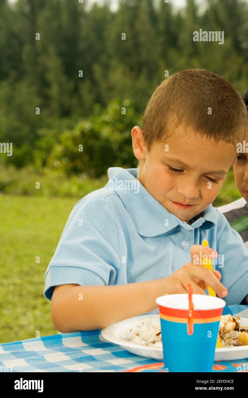 Boy 4 5 sitting in foreground hi-res stock photography and images - Alamy