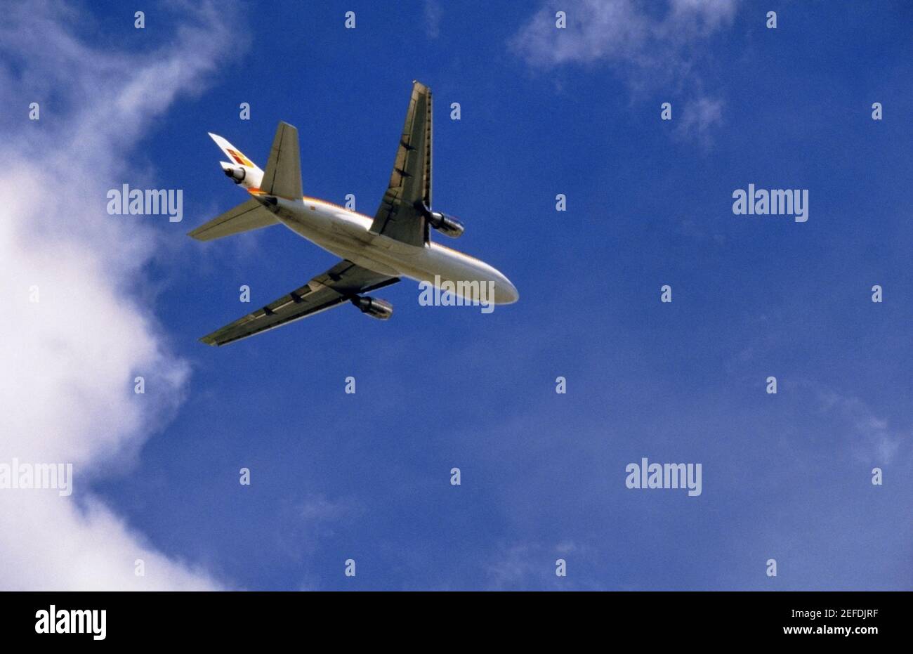Airplane in flight, low angle view hi-res stock photography and images ...
