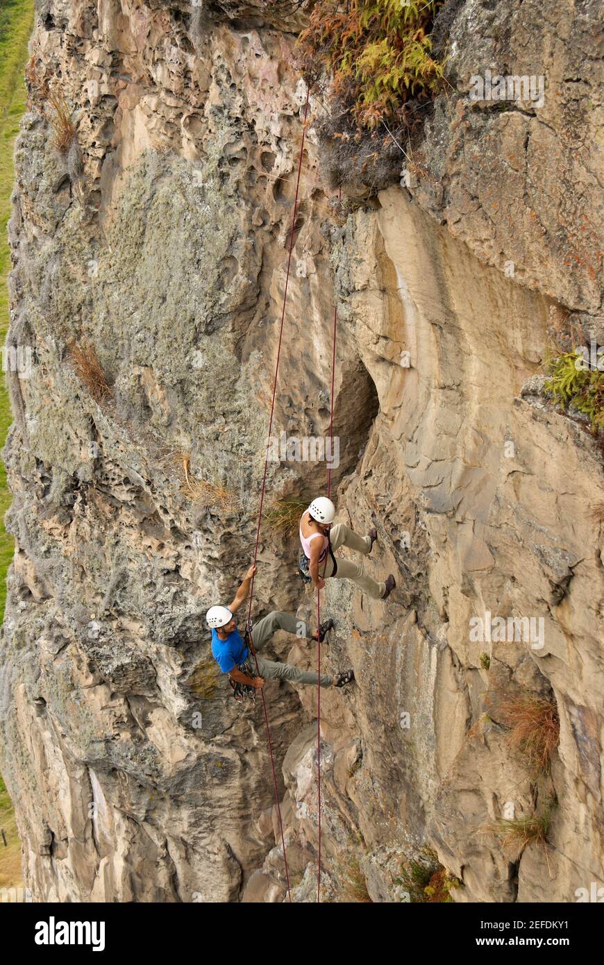 Male climber scaling rock face hi-res stock photography and images - Alamy