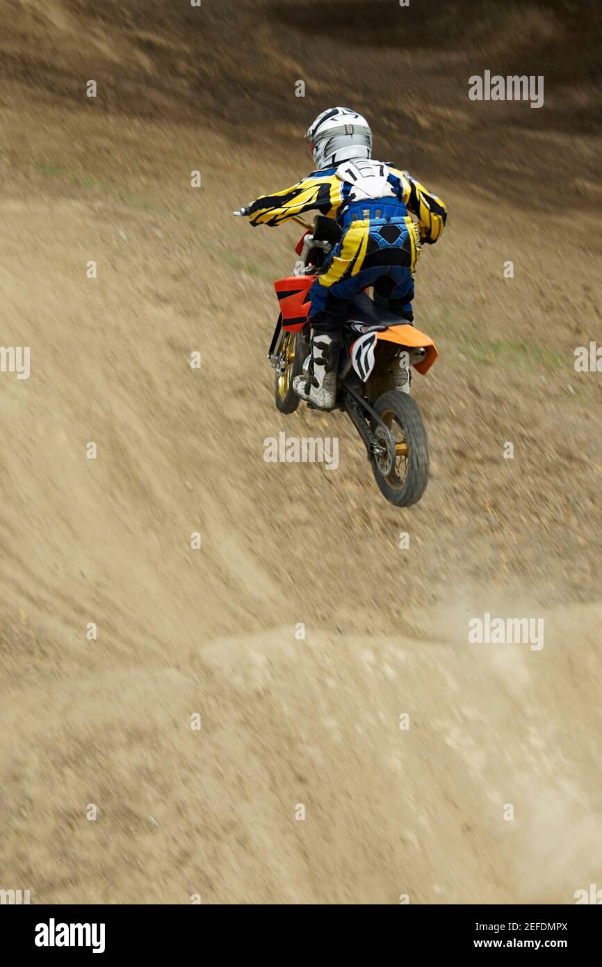 Motocross rider performing jump on hi-res stock photography and images ...