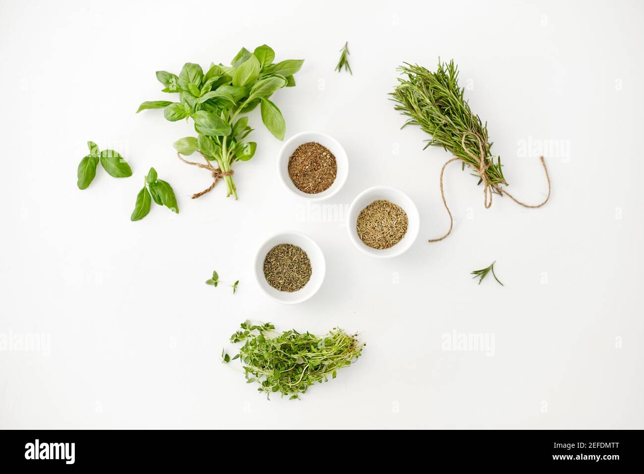fresh and dry seasoning on white background Stock Photo - Alamy