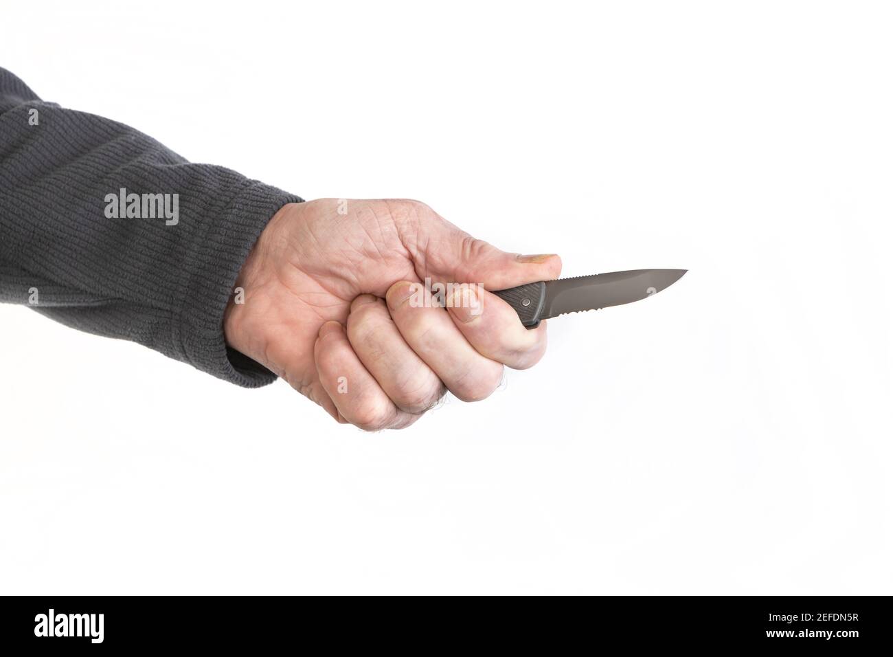 Hand holding stabbing knife hi-res stock photography and images - Alamy