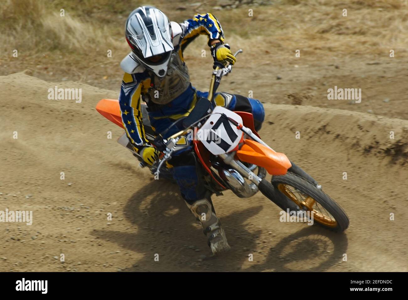 High angle view of a motocross rider riding a motorcycle Stock Photo ...