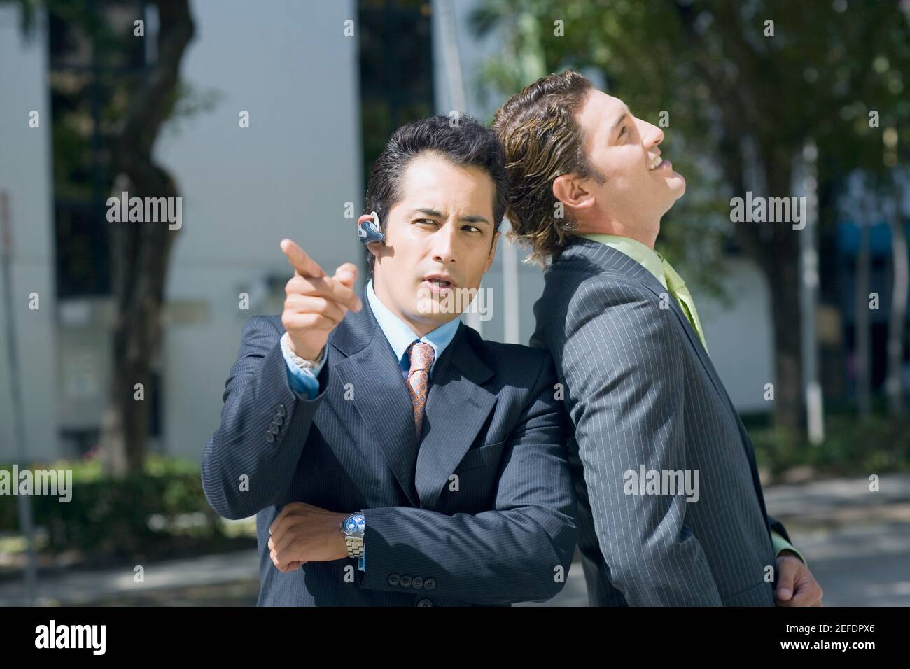 Mid adult male leaning forward hi-res stock photography and images - Alamy