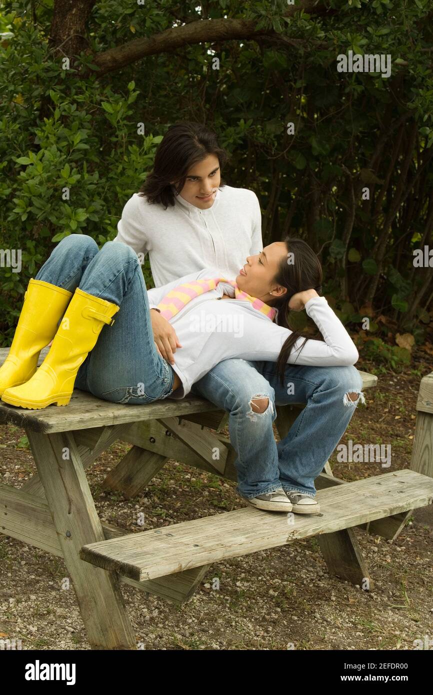Man lying on lap of a woman hi-res stock photography and images - Alamy