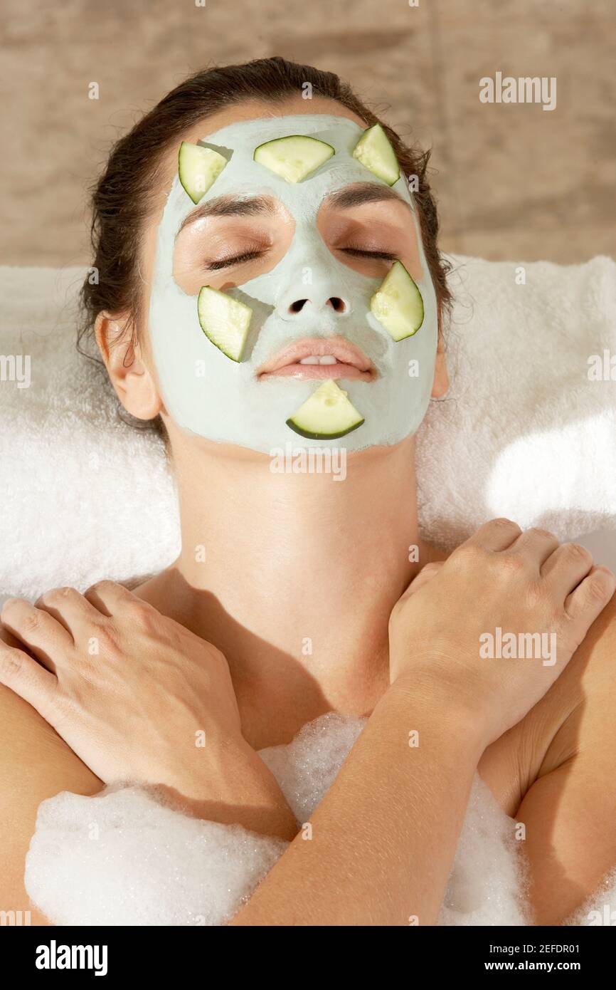 Black woman cucumber eye mask woman hi-res stock photography and images ...