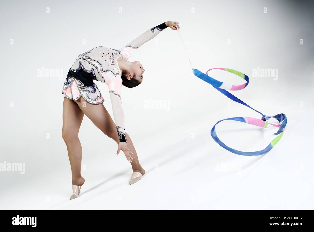 Female gymnast practicing with a ribbon Stock Photo - Alamy