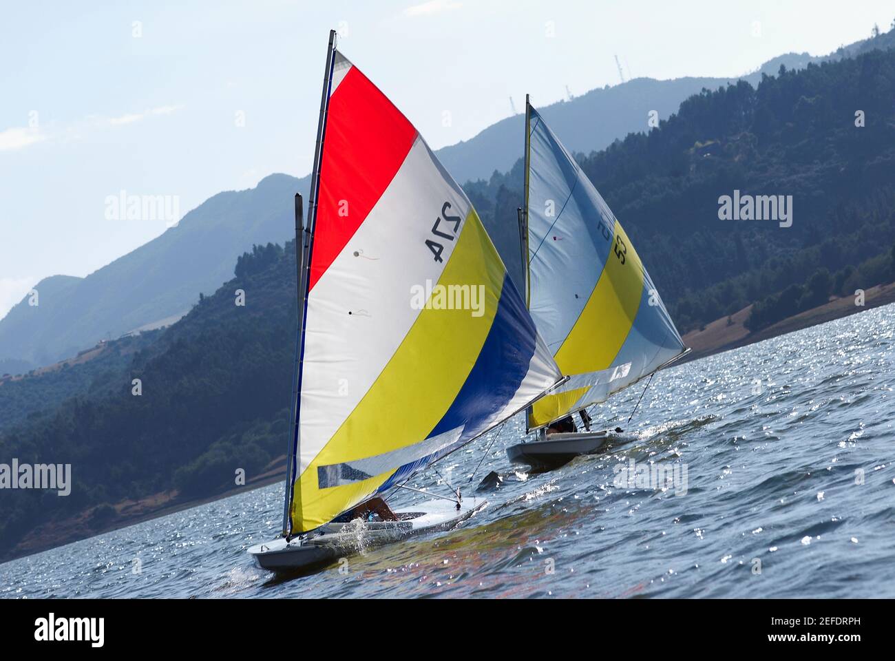 Sailboats participating in a race Stock Photo - Alamy