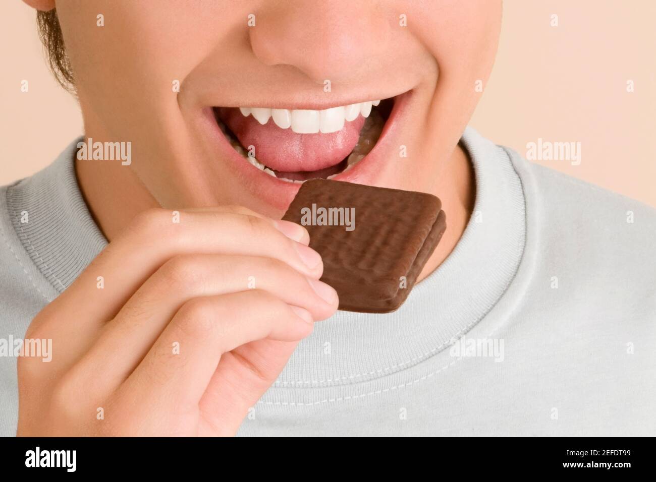 Man eating biscuit hi-res stock photography and images - Alamy