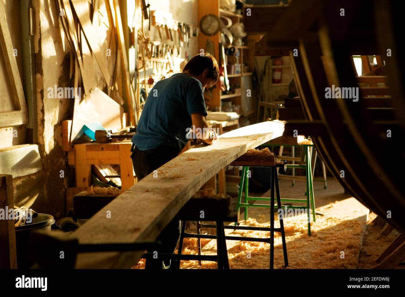 Rear view carpenter working hi-res stock photography and images - Alamy