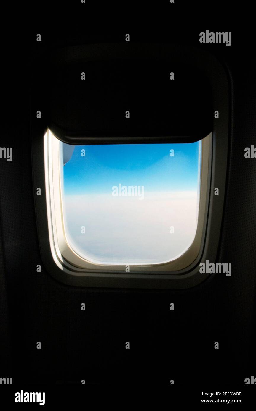 Close-up of an airplane window Stock Photo - Alamy