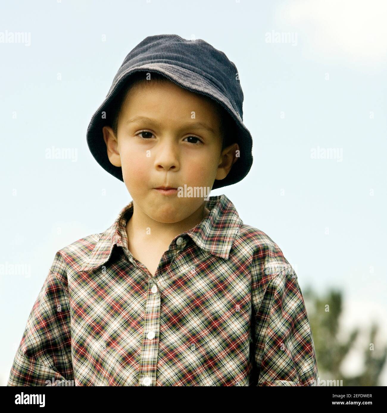 Portrait of a boy wearing a hat Stock Photo - Alamy