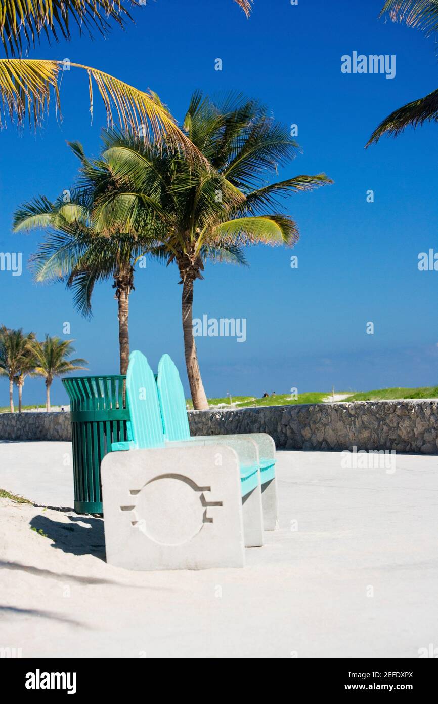Garbage bin near a bench, Miami, Florida, USA Stock Photo - Alamy