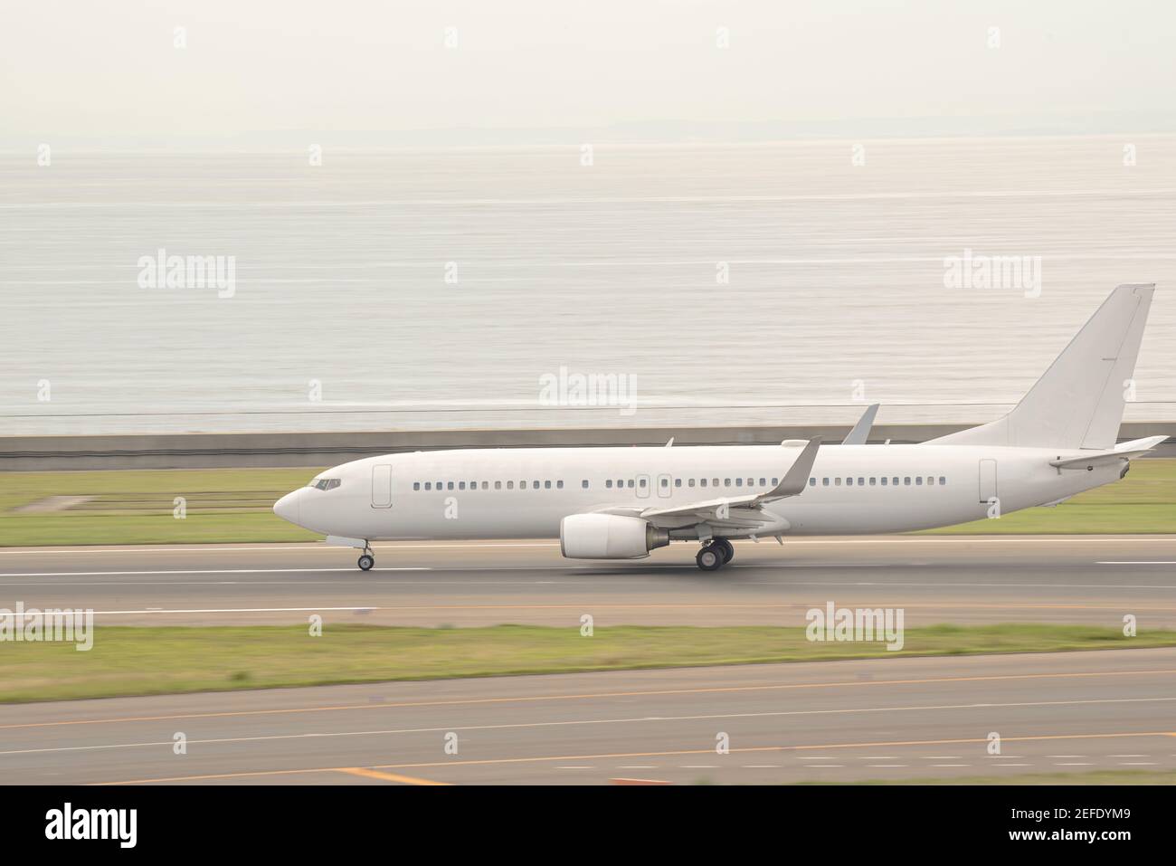 an airplane getting to take off Stock Photo - Alamy