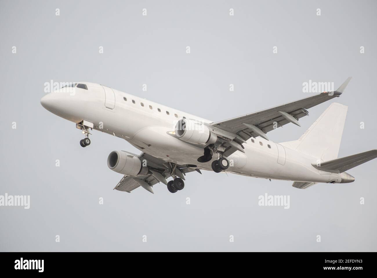 an airplane getting to land Stock Photo - Alamy