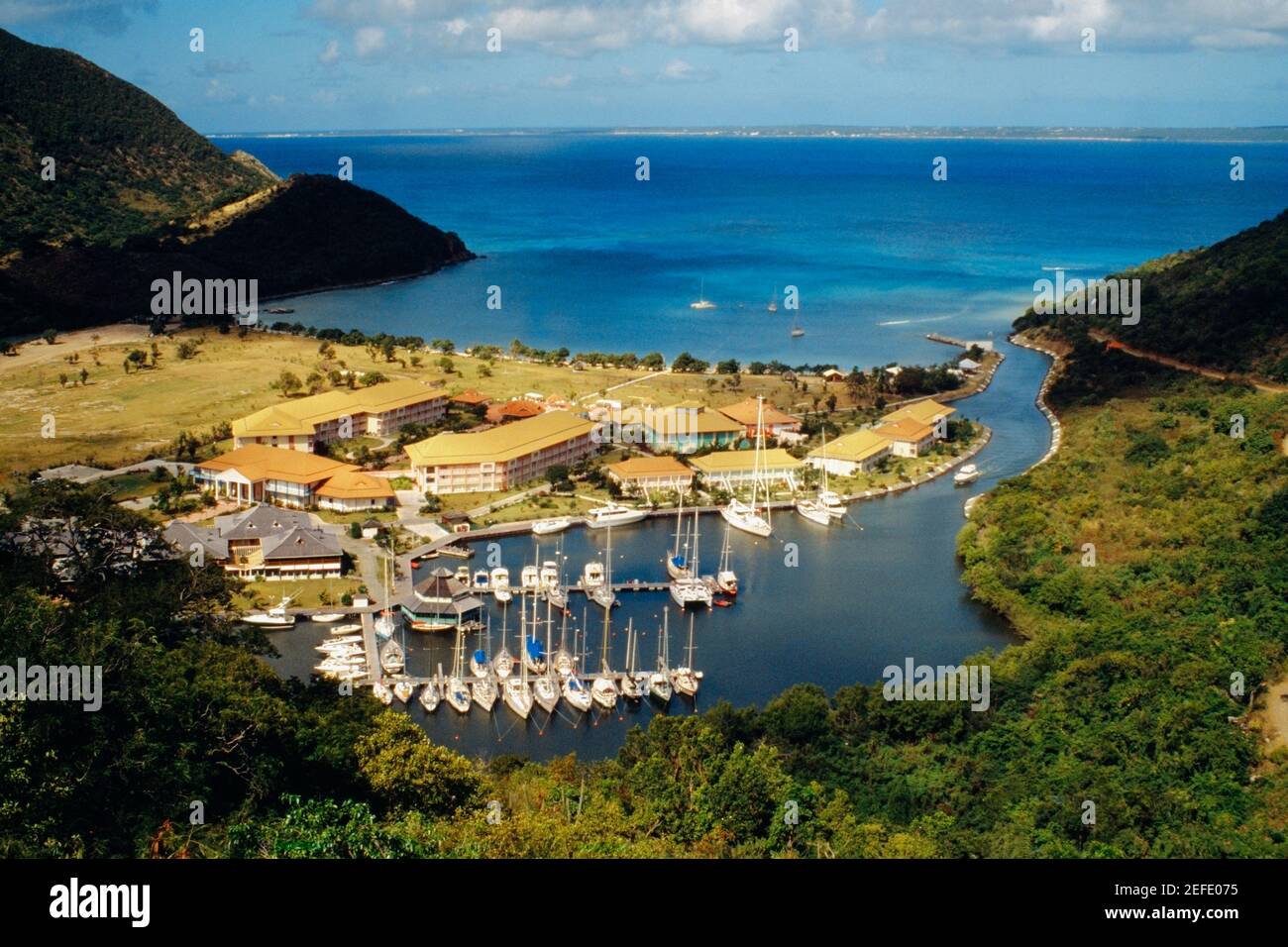 A fleet of ships anchored at a harbor, St. Maarten, Caribbean Stock ...
