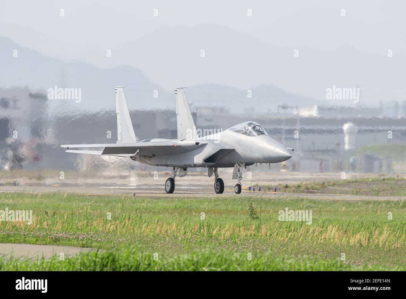 armed airplane(fighter) ready to take off on runway from airport Stock ...
